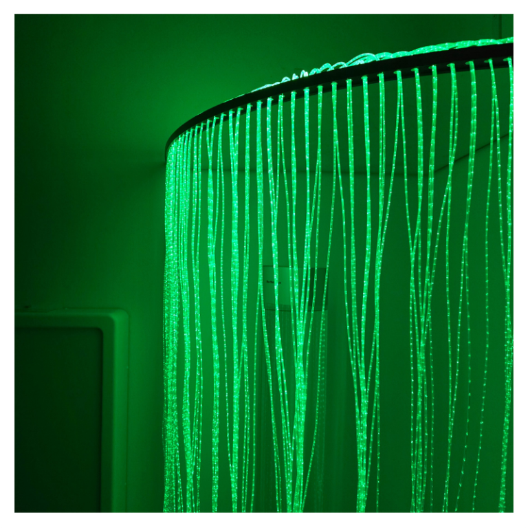Fibre optic light curtain for sensory room corner
